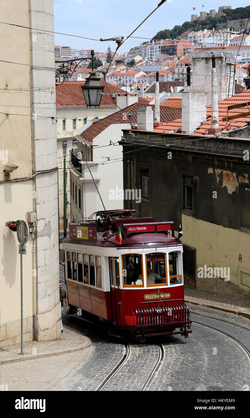 Antique trolleys in Lisbon, Portugal. Vintage yellow trams Stock Photo ...