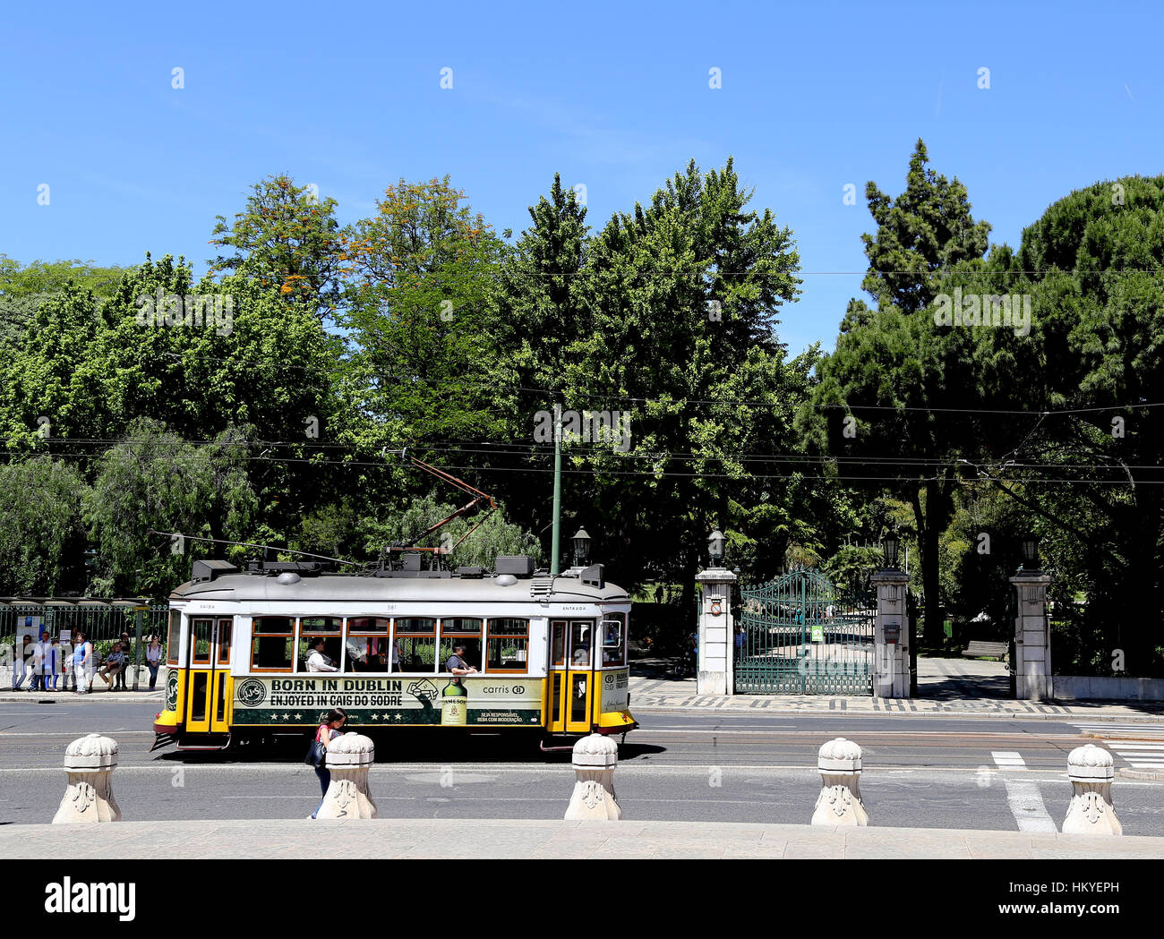 Antique trolleys in Lisbon, Portugal. Vintage yellow trams Stock Photo ...