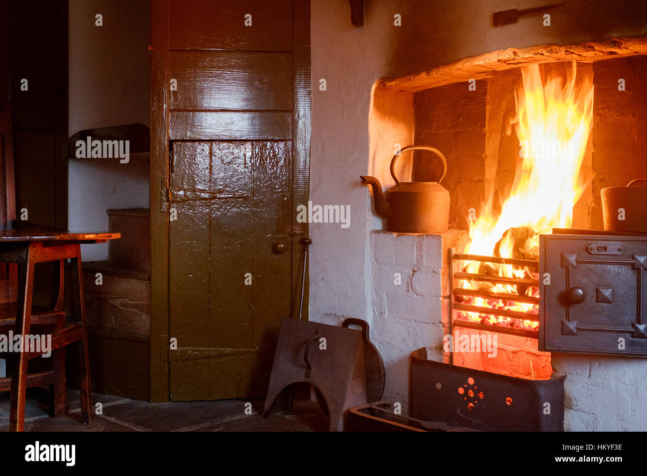 A blazing fire in a miner's cottage Stock Photo - Alamy