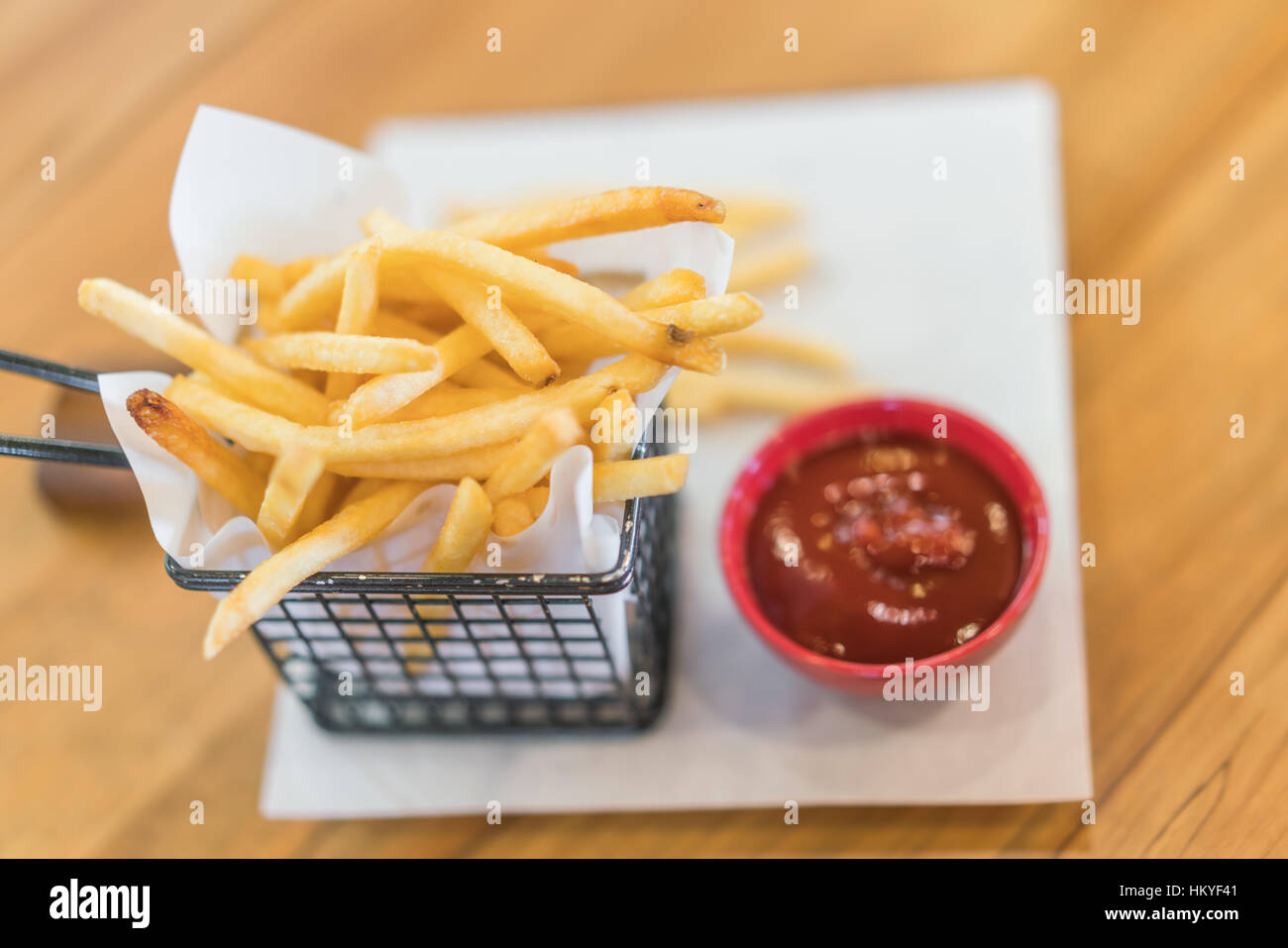 French fries on wood table Stock Photo - Alamy