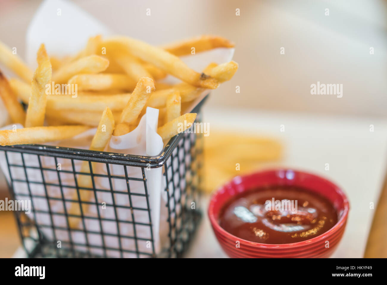 French fries on wood table Stock Photo - Alamy