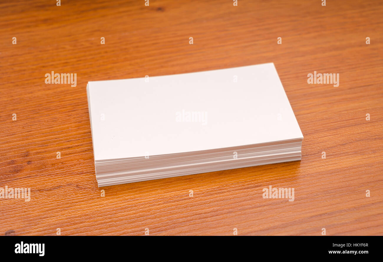 Business cards on wood table Stock Photo - Alamy
