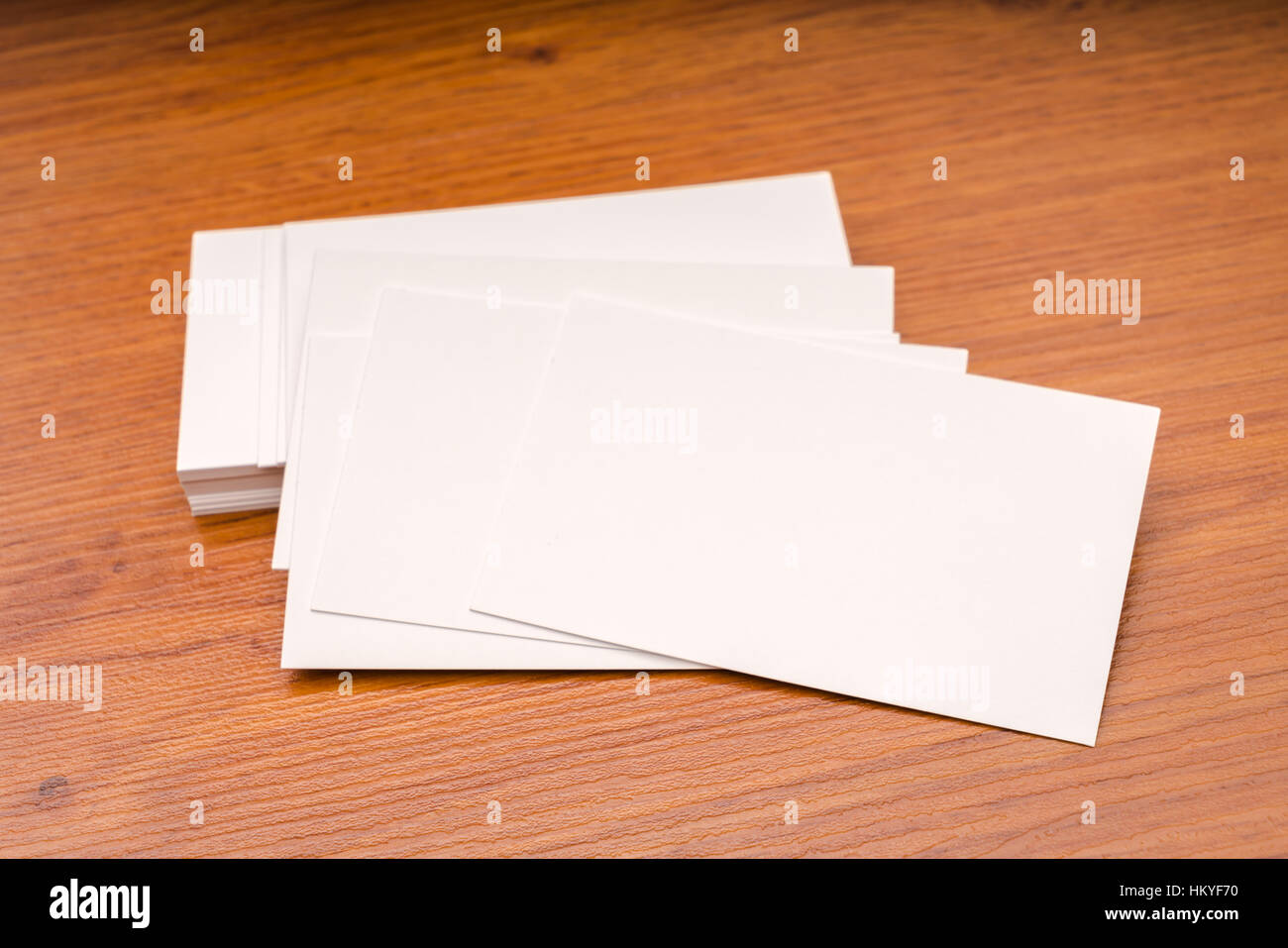 Business cards on wood table Stock Photo - Alamy