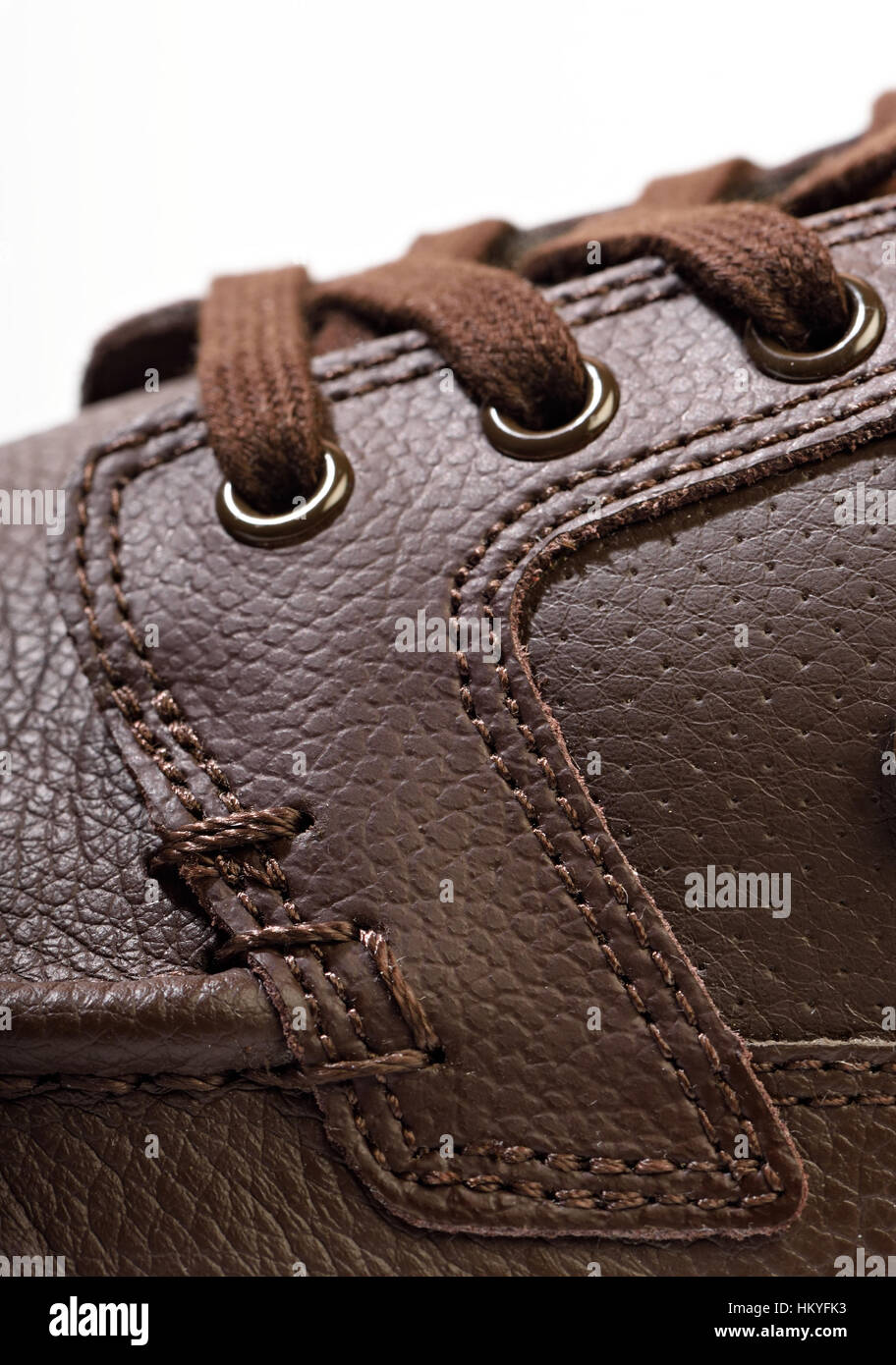 texture of leather brown shoes on white background Stock Photo - Alamy