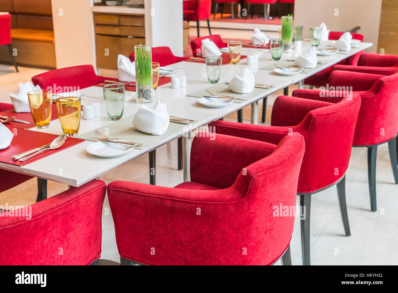 Tables and chairs in restaurant Stock Photo - Alamy