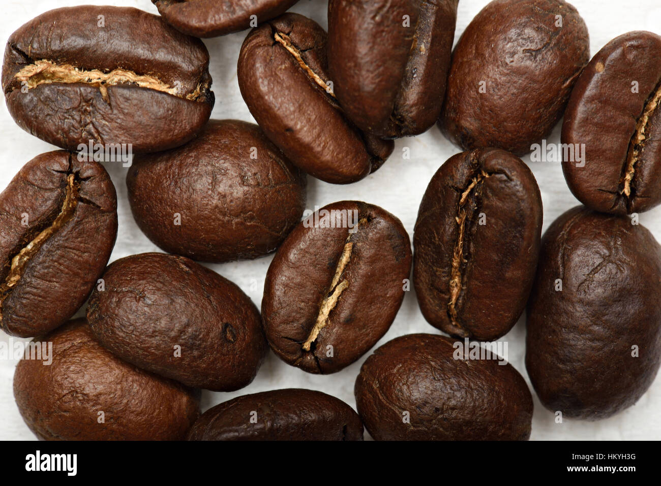 close up of coffee beans isolated on white background Stock Photo - Alamy