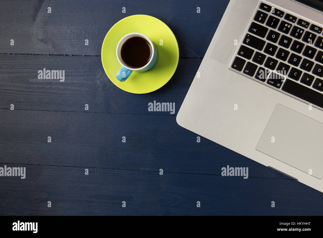 Coffee cup and laptop computer Stock Photo - Alamy