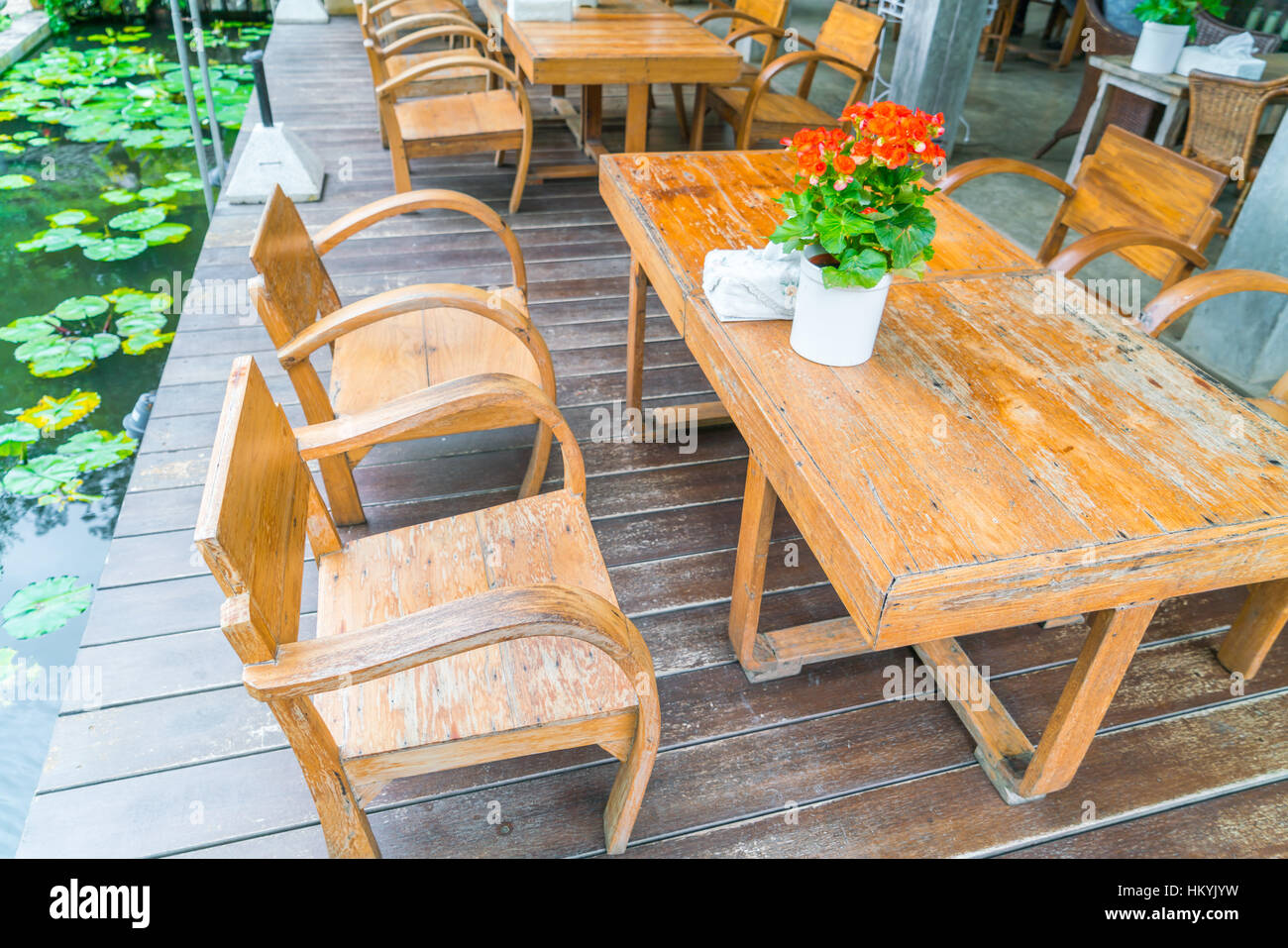 Tables and Chair in outdoor cafe restaurant Stock Photo - Alamy