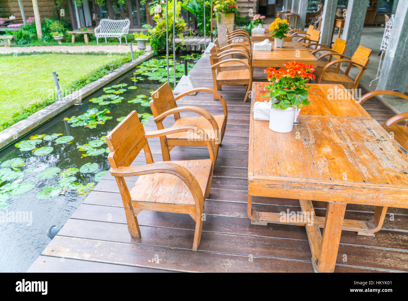 Tables and Chair in outdoor cafe restaurant Stock Photo - Alamy