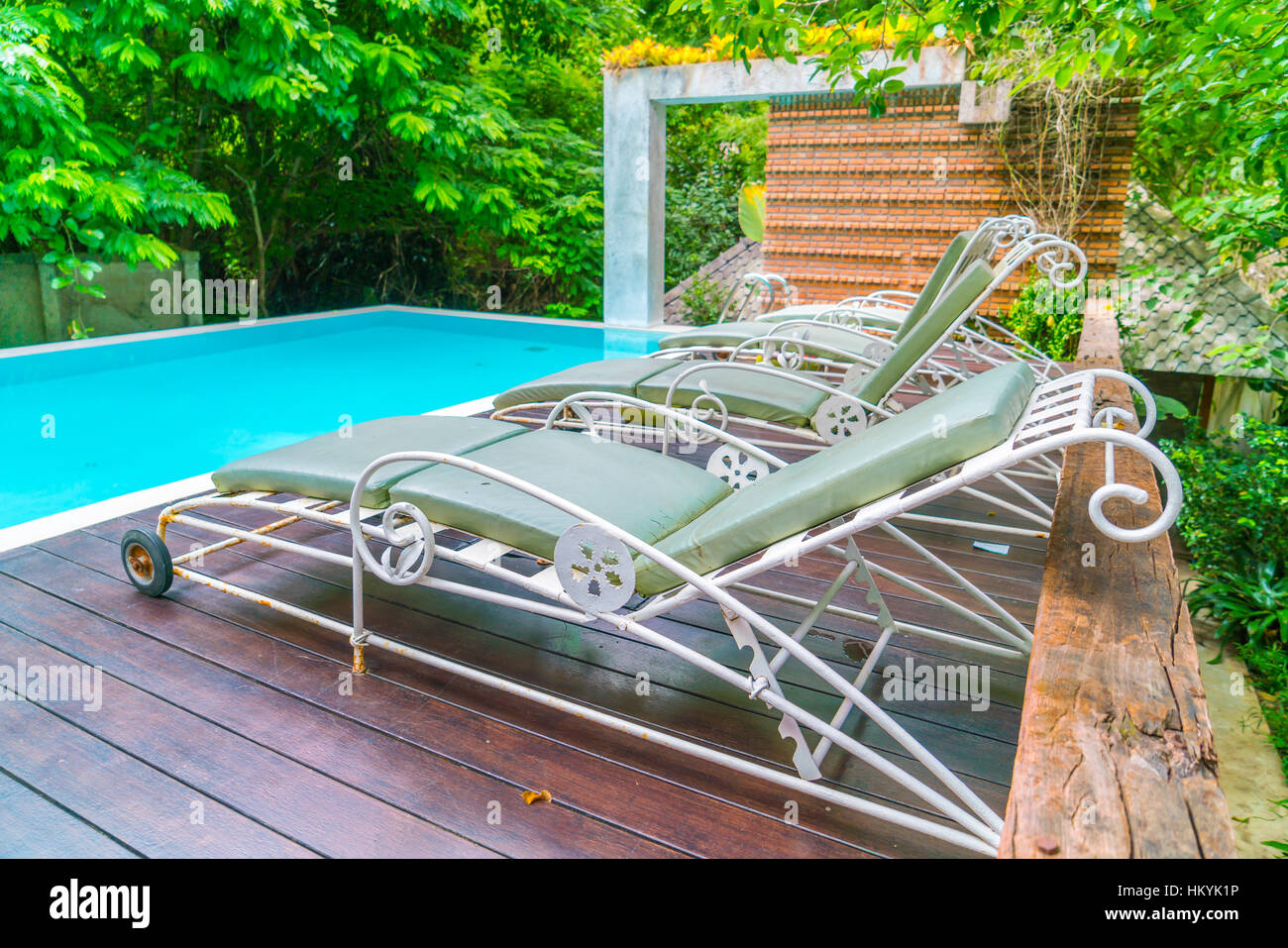 Swimming pool with relaxing seats Stock Photo - Alamy