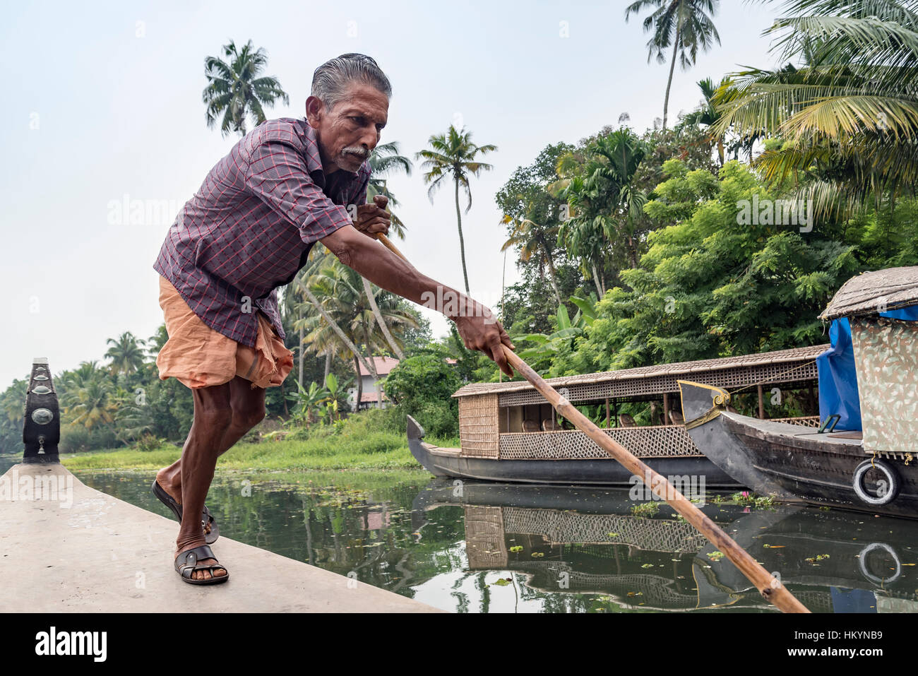 Indian man boatman rowing boat hi-res stock photography and images - Alamy