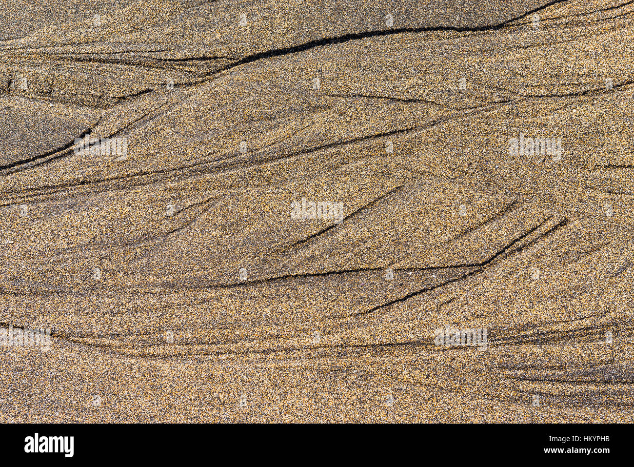 Wet sand pattern at the beach on Iceland in brown and black Stock Photo ...