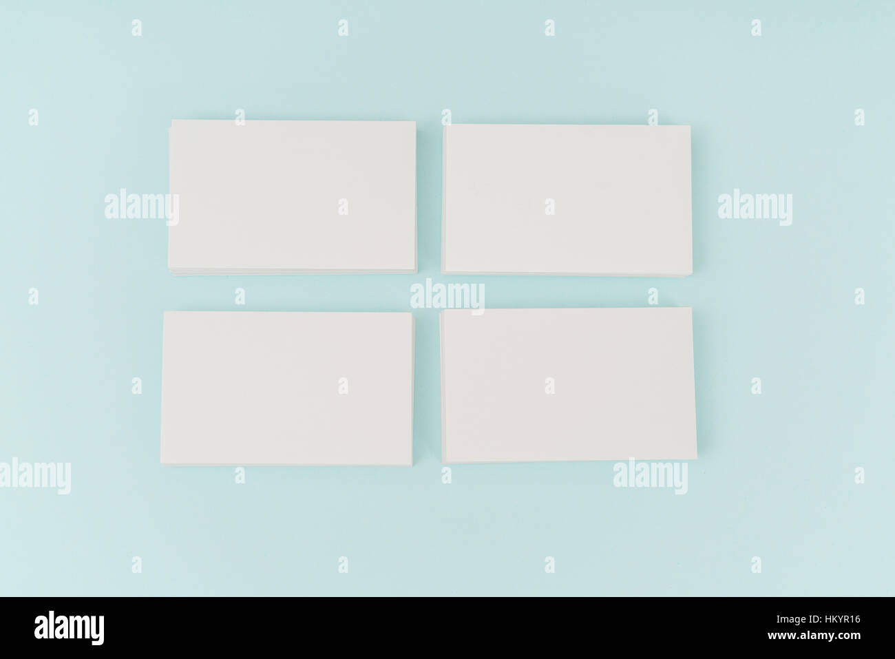 Blank business card on blue background Stock Photo - Alamy