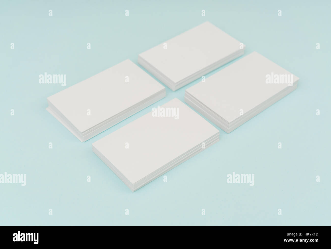 Blank business card on blue background Stock Photo - Alamy