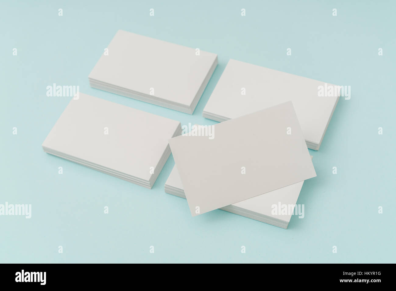 Blank business card on blue background Stock Photo - Alamy