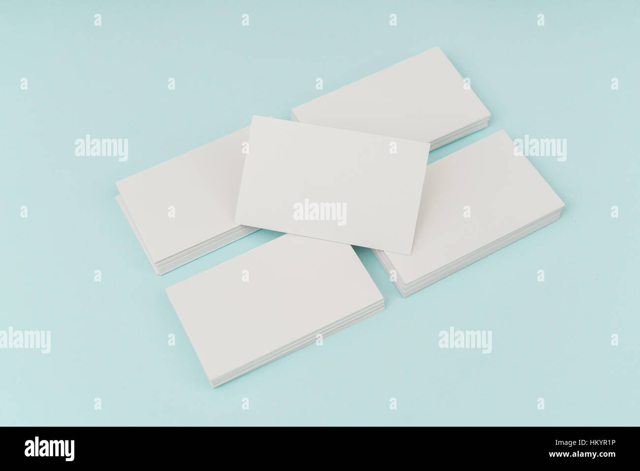 Blank business card on blue background Stock Photo - Alamy
