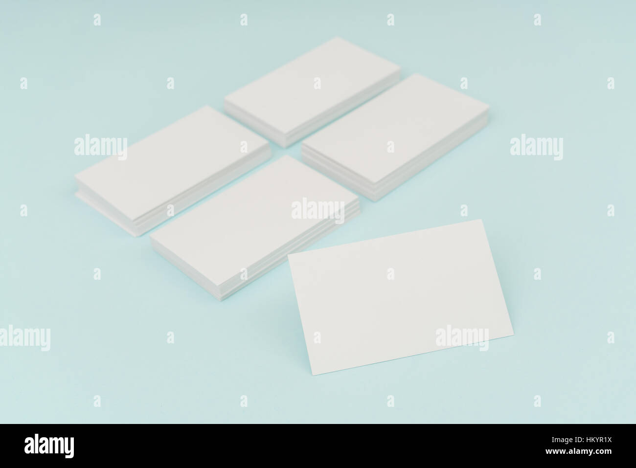 Blank business card on blue background Stock Photo - Alamy