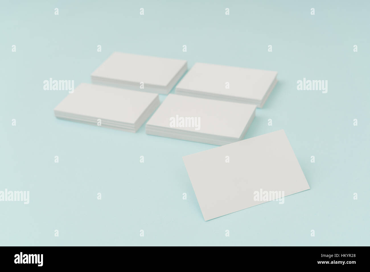 Blank business card on blue background Stock Photo - Alamy