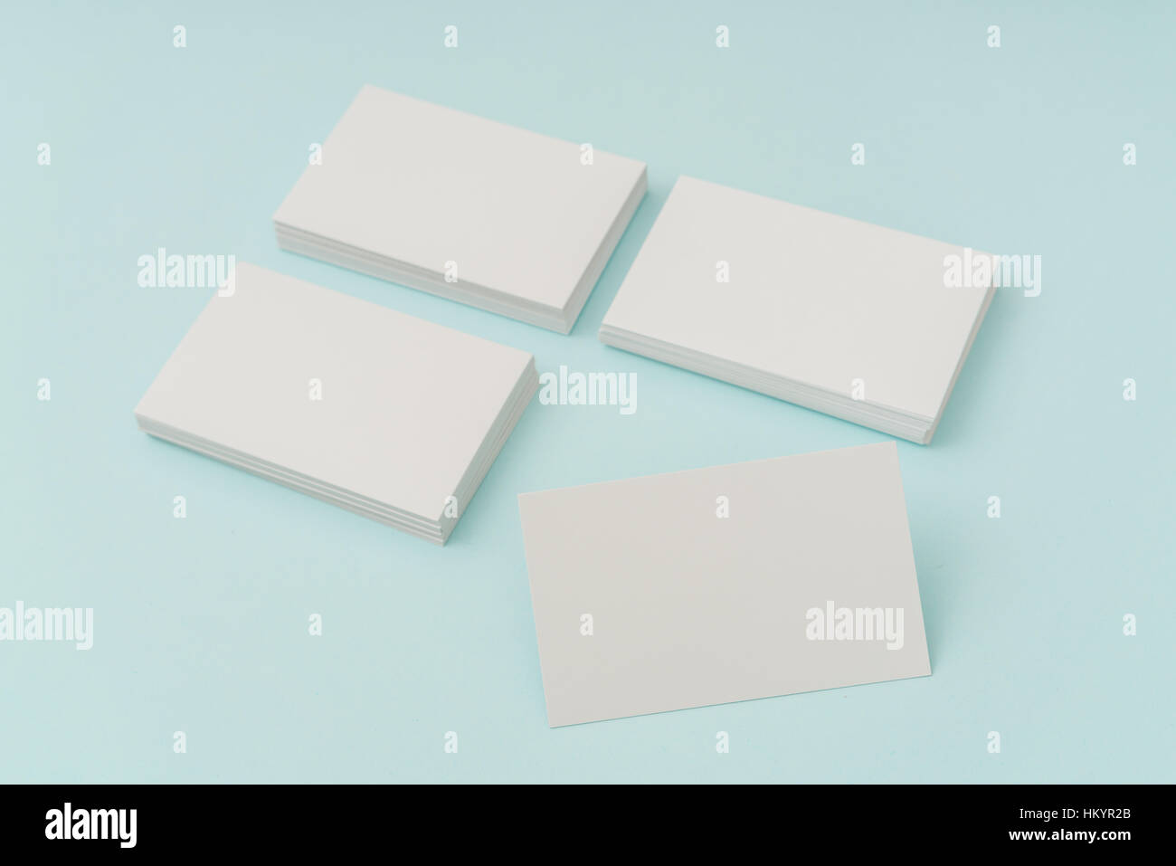 Blank business card on blue background Stock Photo - Alamy