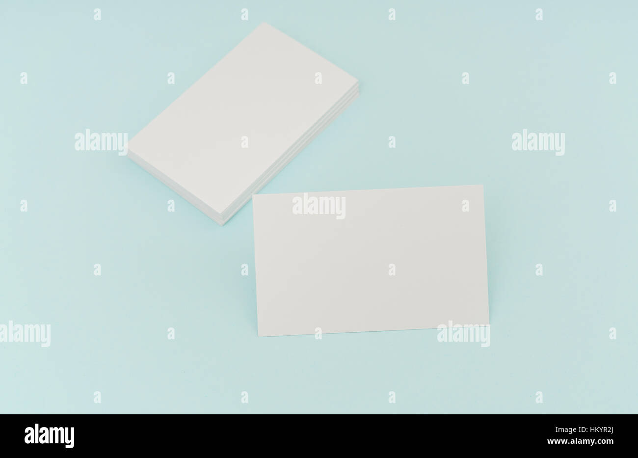 Blank business card on blue background Stock Photo - Alamy