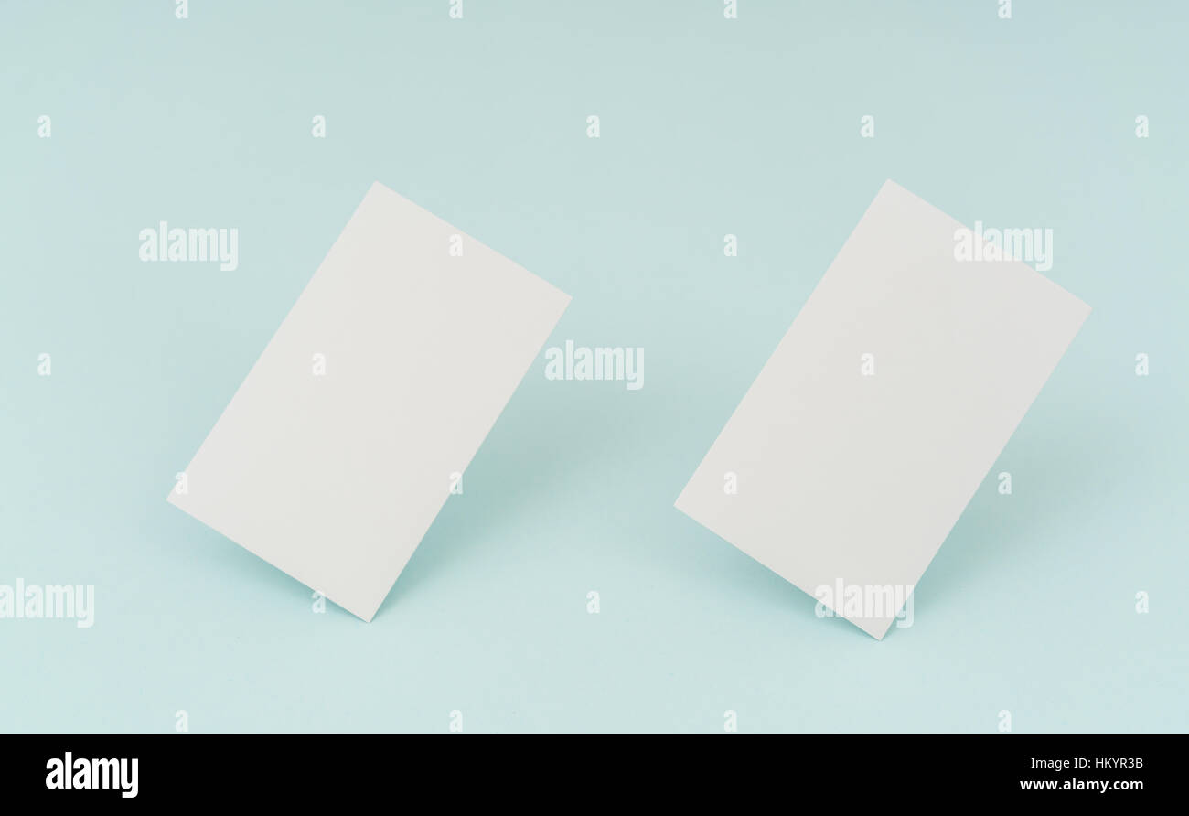 Blank business card on blue background Stock Photo - Alamy