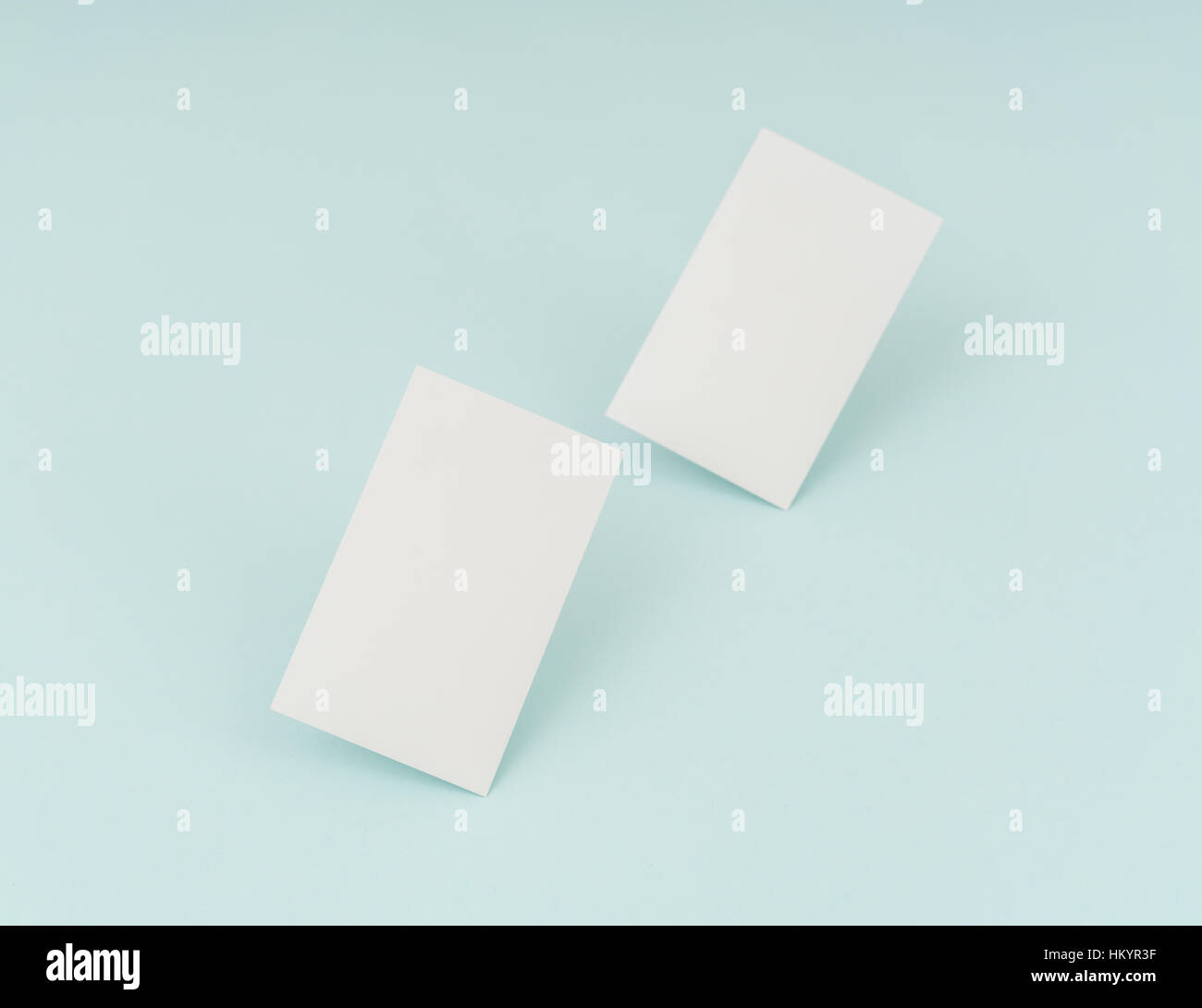 Blank business card on blue background Stock Photo - Alamy