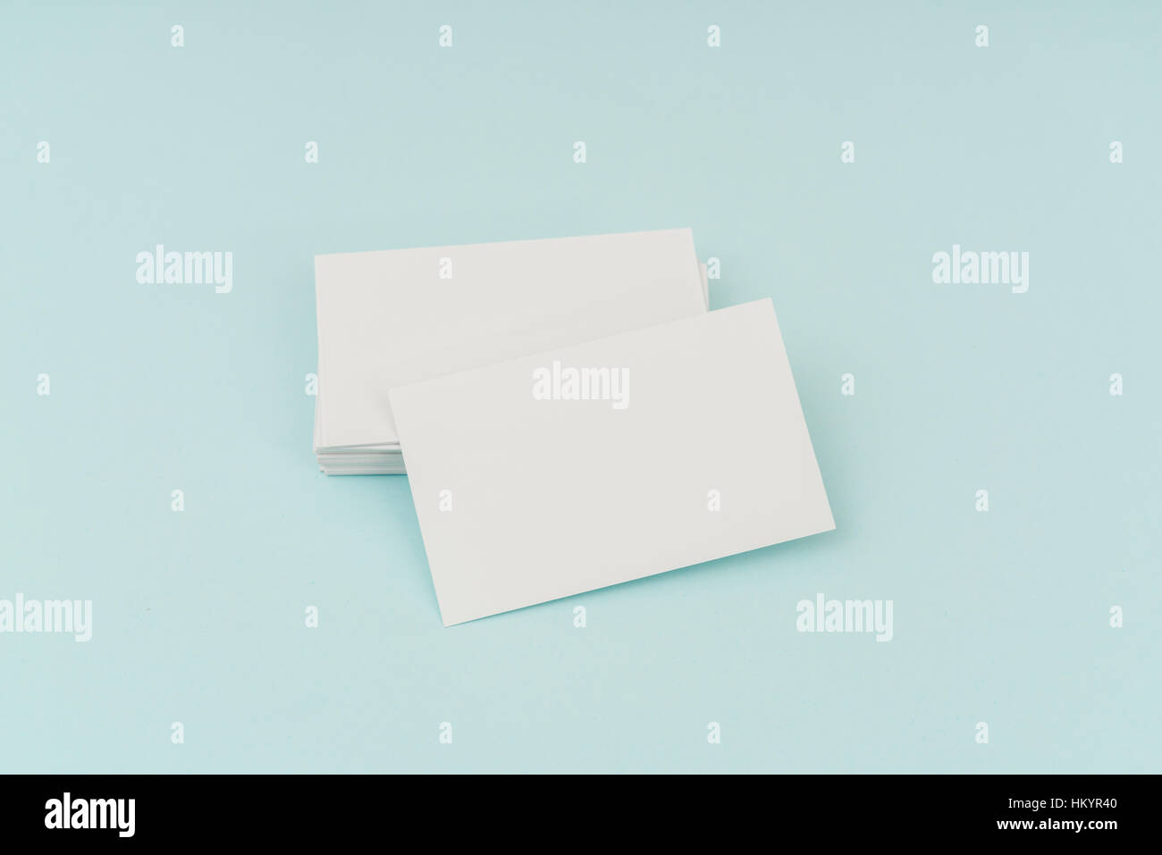 Blank business card on blue background Stock Photo - Alamy
