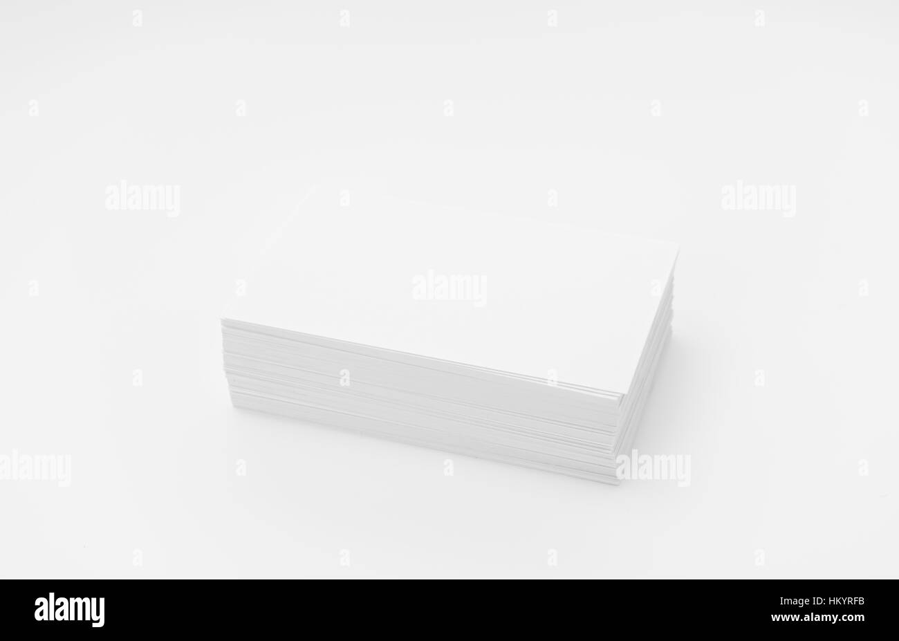 Business cards on white background Stock Photo - Alamy