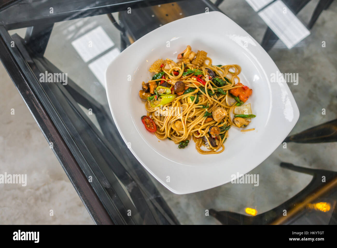 Spicy spaghetti with seafood Stock Photo - Alamy