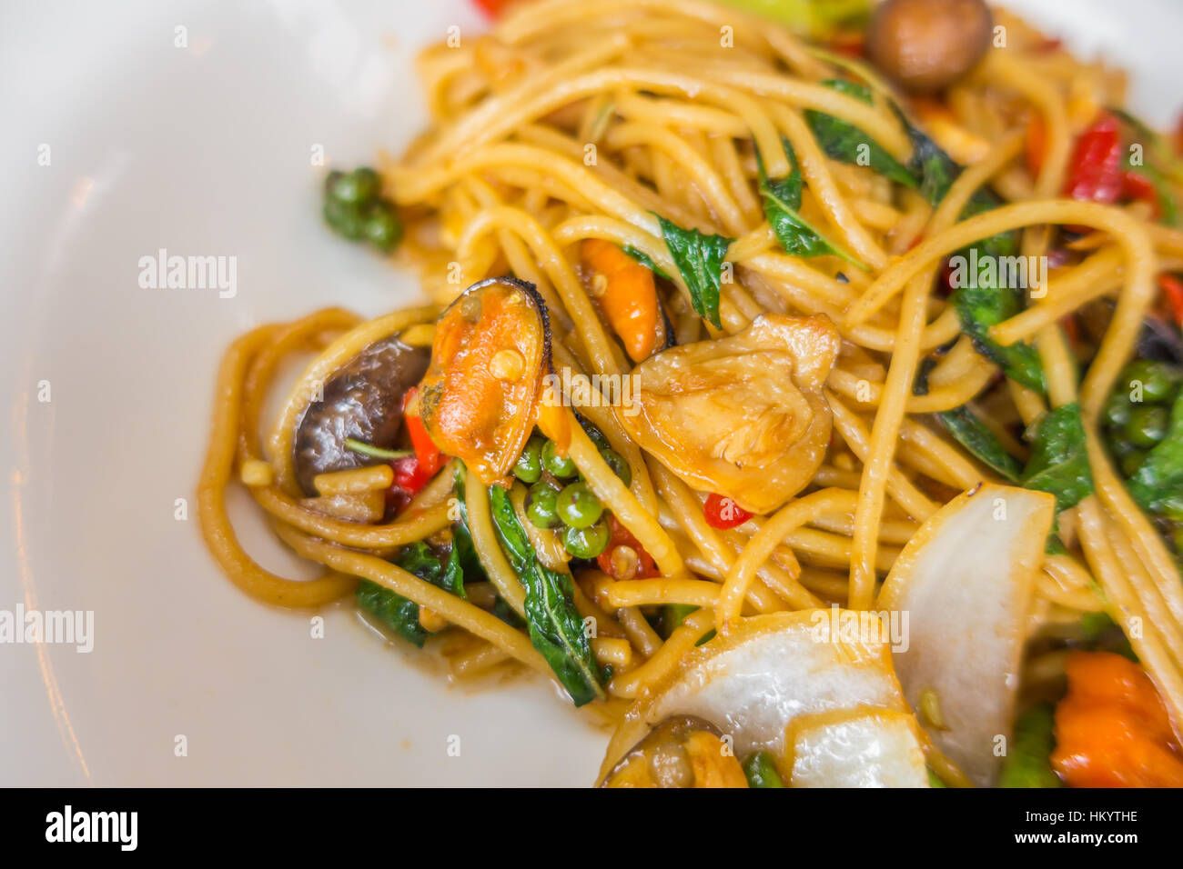 Spicy spaghetti with seafood Stock Photo - Alamy