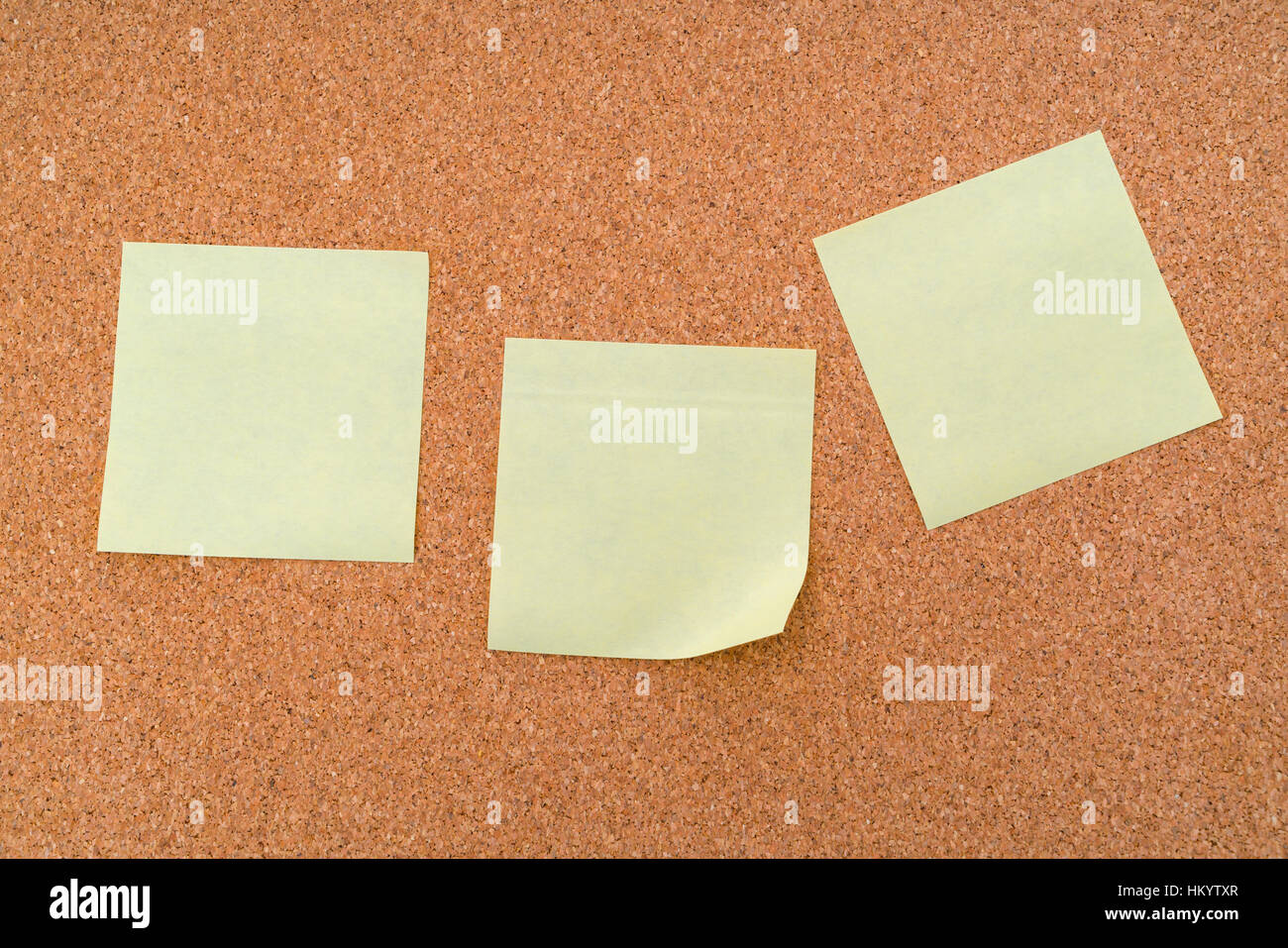 Post it notes on cork board Stock Photo - Alamy