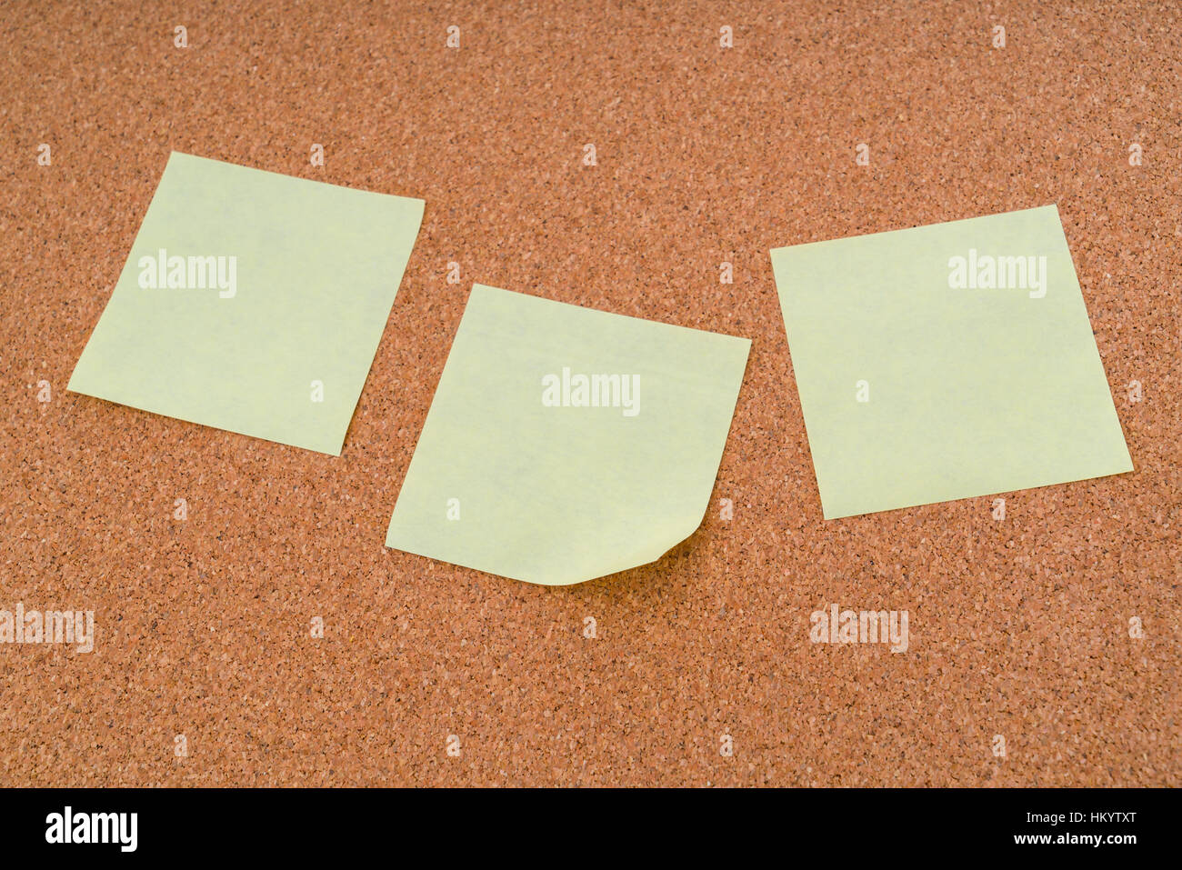 Post it notes on cork board Stock Photo - Alamy