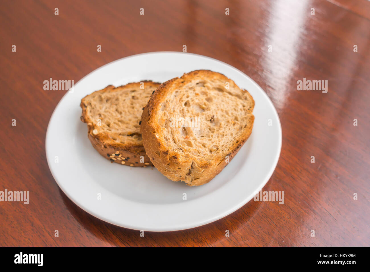 Toast bread in a white plate Stock Photo - Alamy