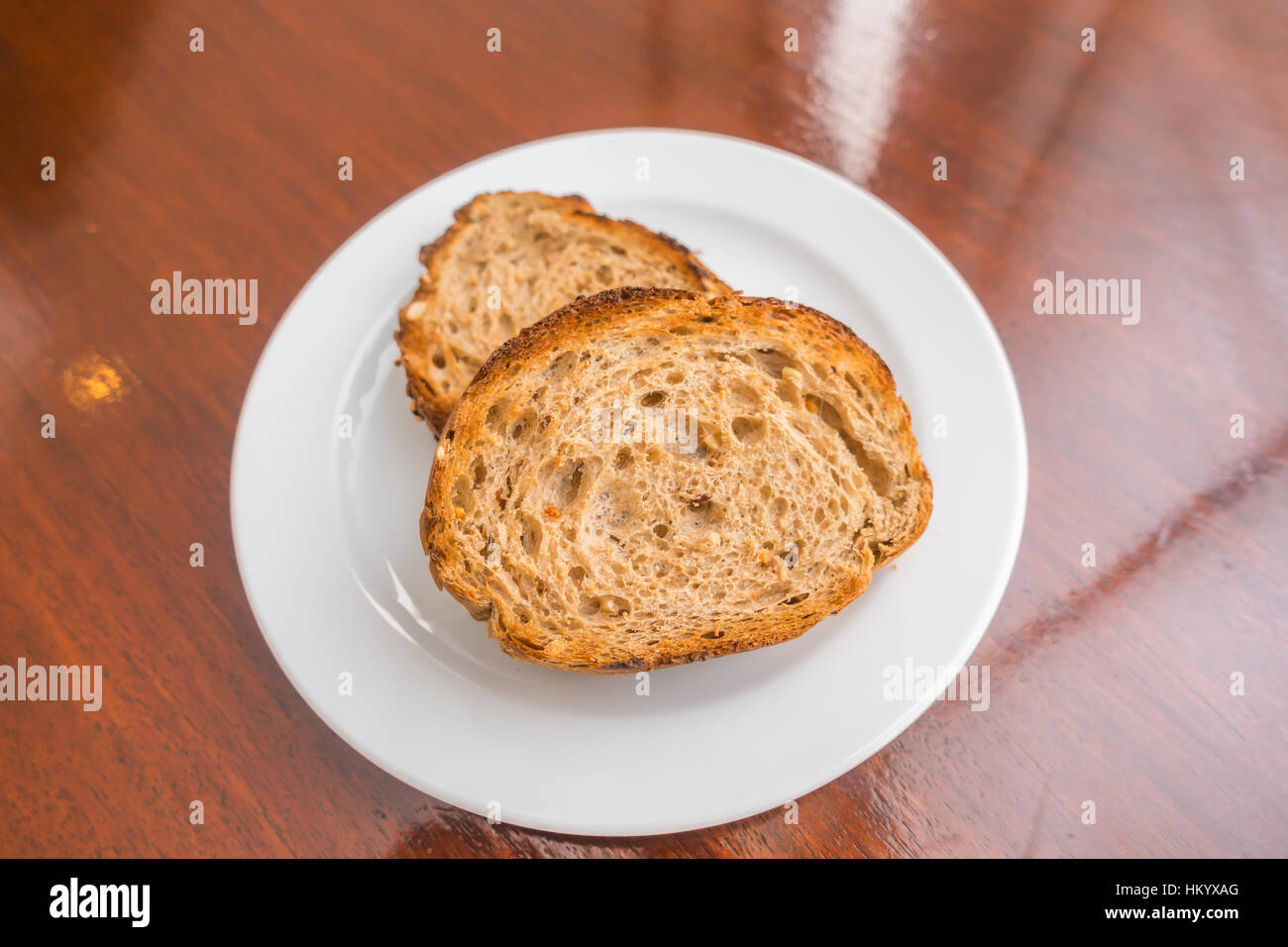 Toast bread in a white plate Stock Photo - Alamy