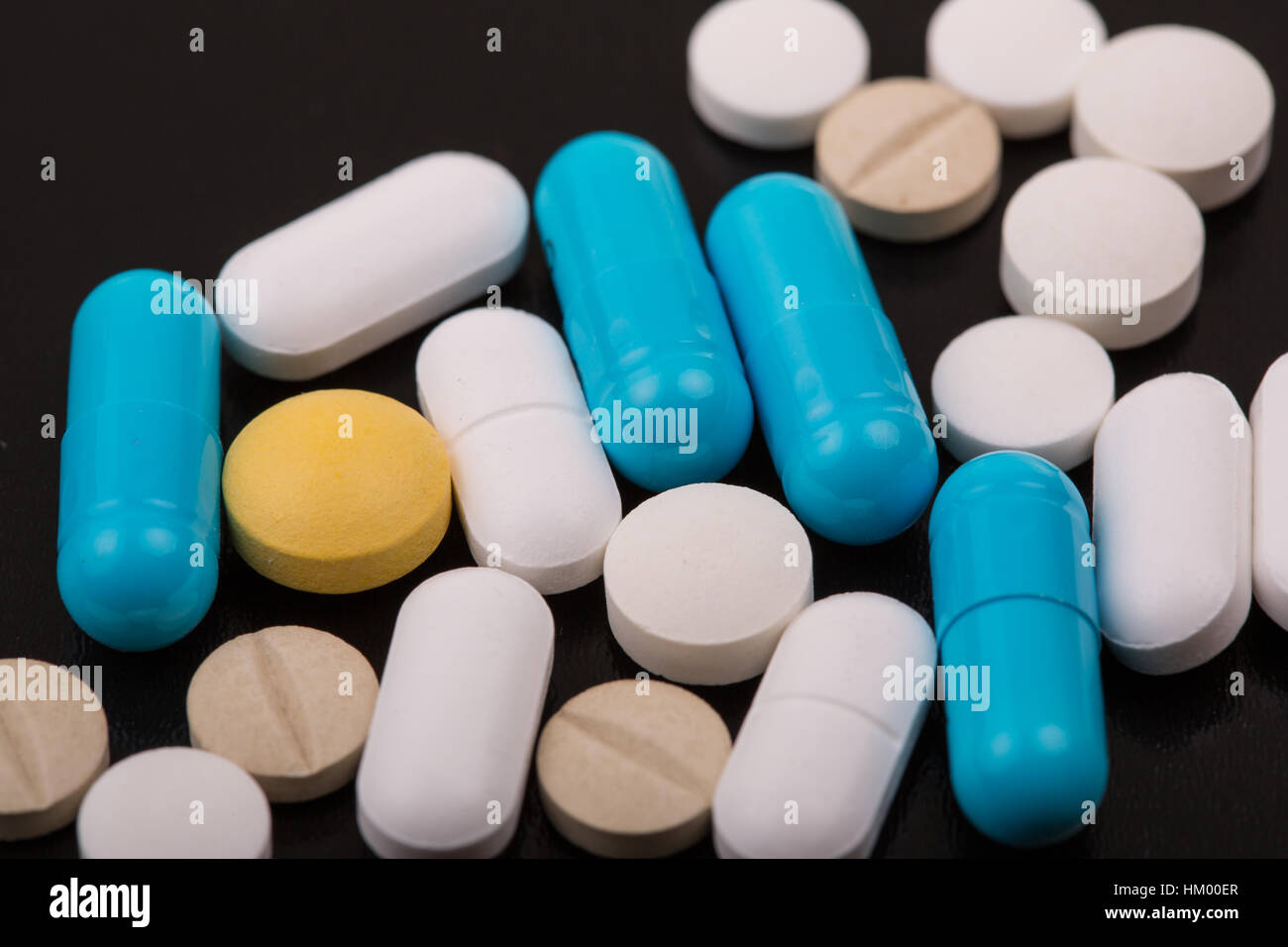 different tablets pills capsule heap mix therapy drugs Stock Photo - Alamy