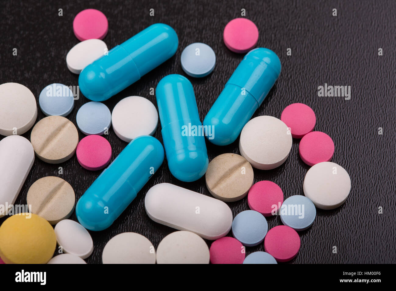 different tablets pills capsule heap mix therapy drugs Stock Photo - Alamy