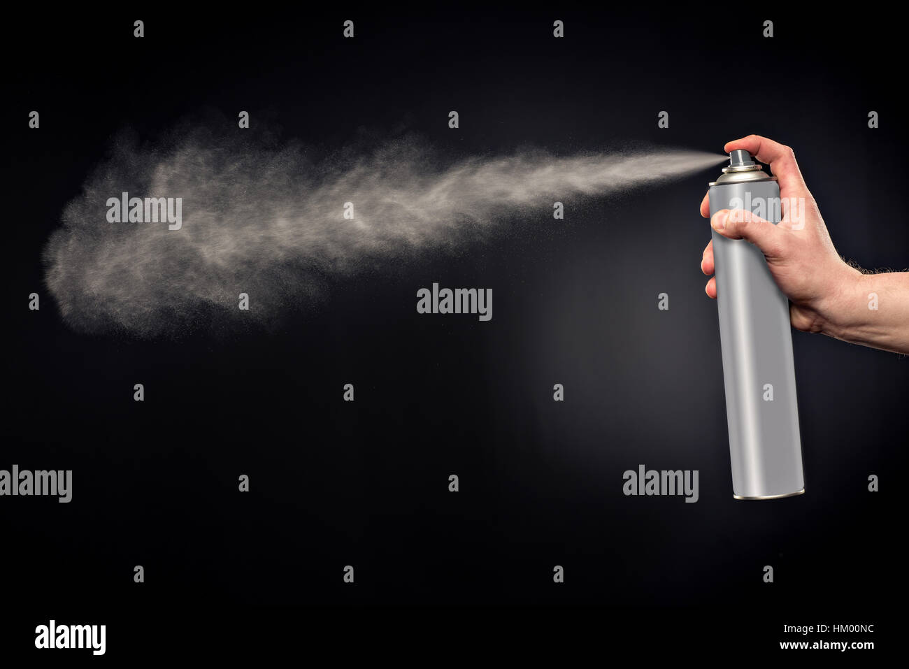 Hand and spray bottle Stock Photo - Alamy