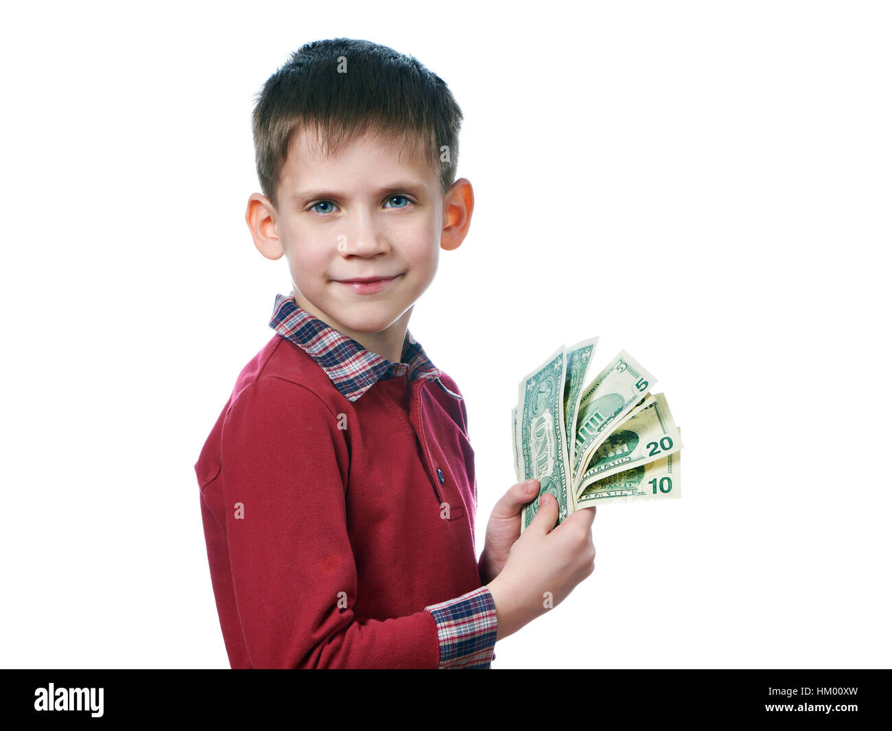 Beautiful little boy with dollar bills in his hands isolated white ...
