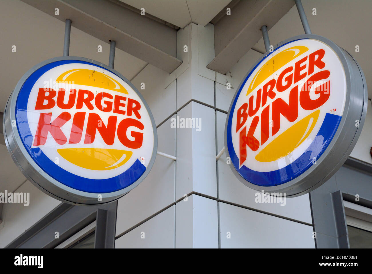 Burger King signs hanging from beam outside fast-food chain restaurant ...