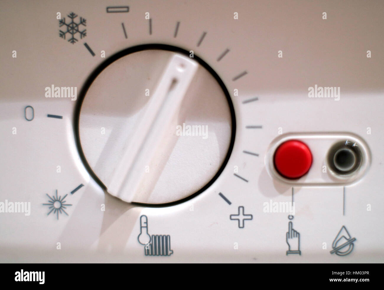 A thermostat dial controlling the temperature of a boiler in a north ...