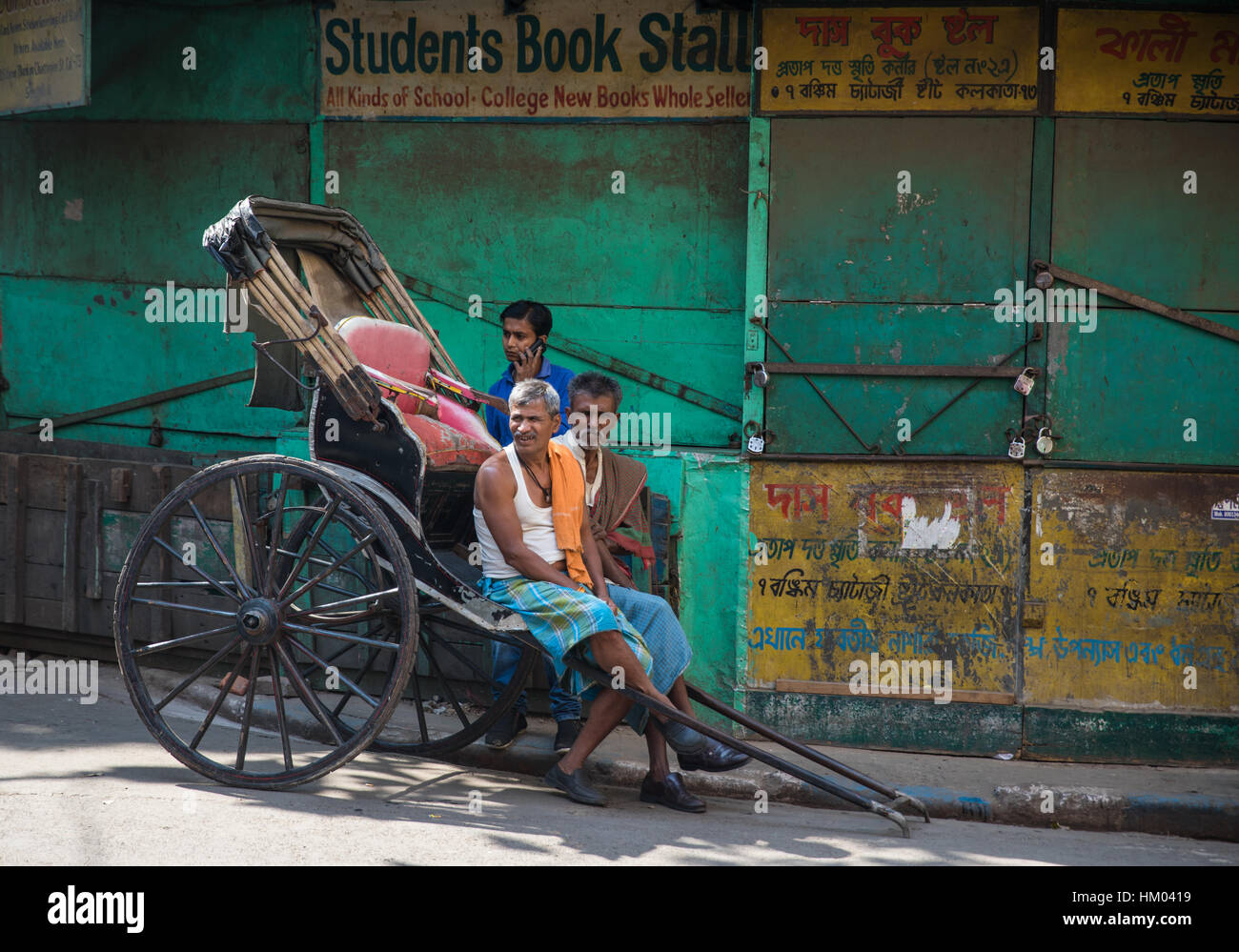 A cycle rickshaw waits for passengers at the College Street book market ...