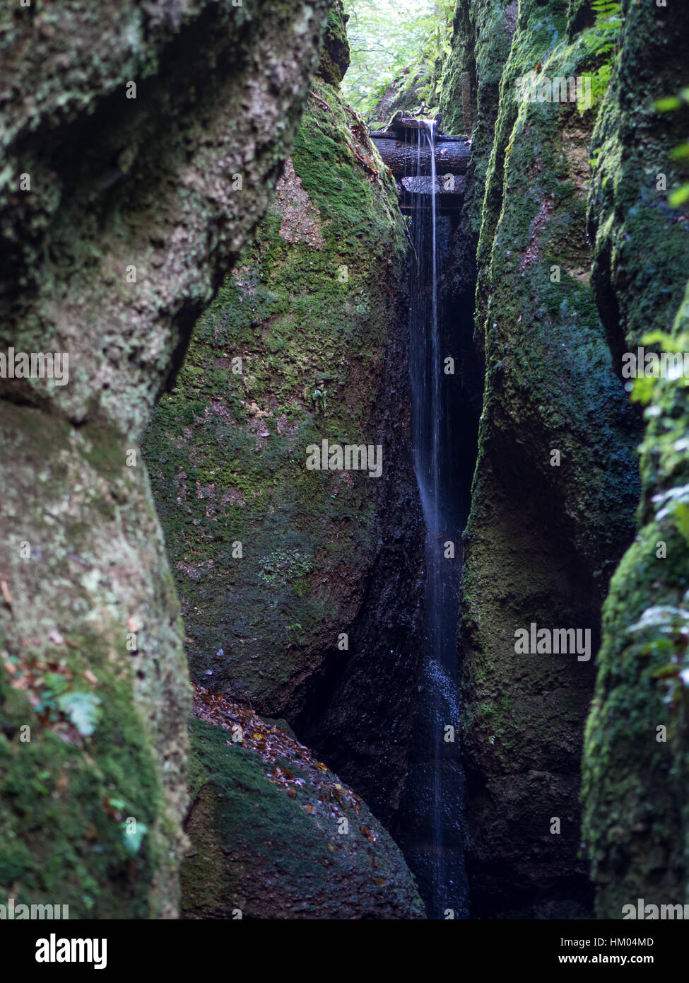 Waterfall at the end of the Dragon canyon near Wartburg in Germany ...
