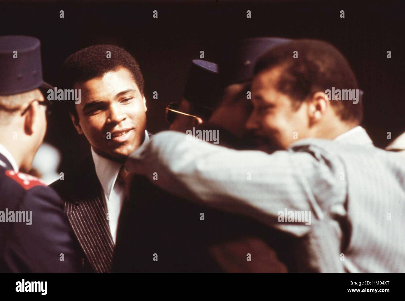 Heavyweight champion Muhammad Ali attends a Muslim service to hear ...