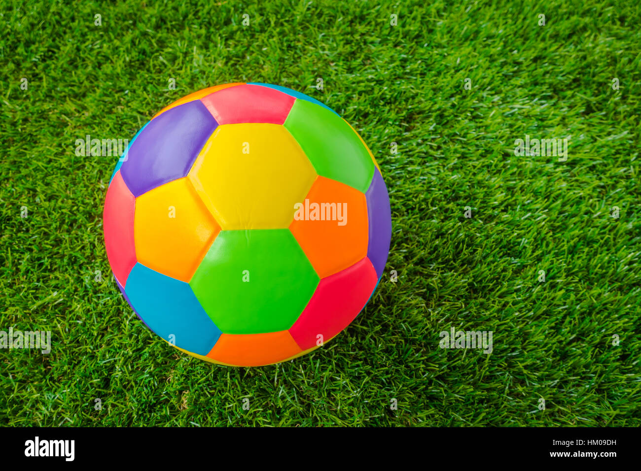 Real leather Colorful multi colour Soccer ball on green grass Stock ...