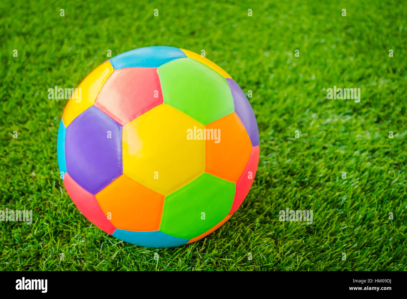 Real leather Colorful multi colour Soccer ball on green grass Stock ...