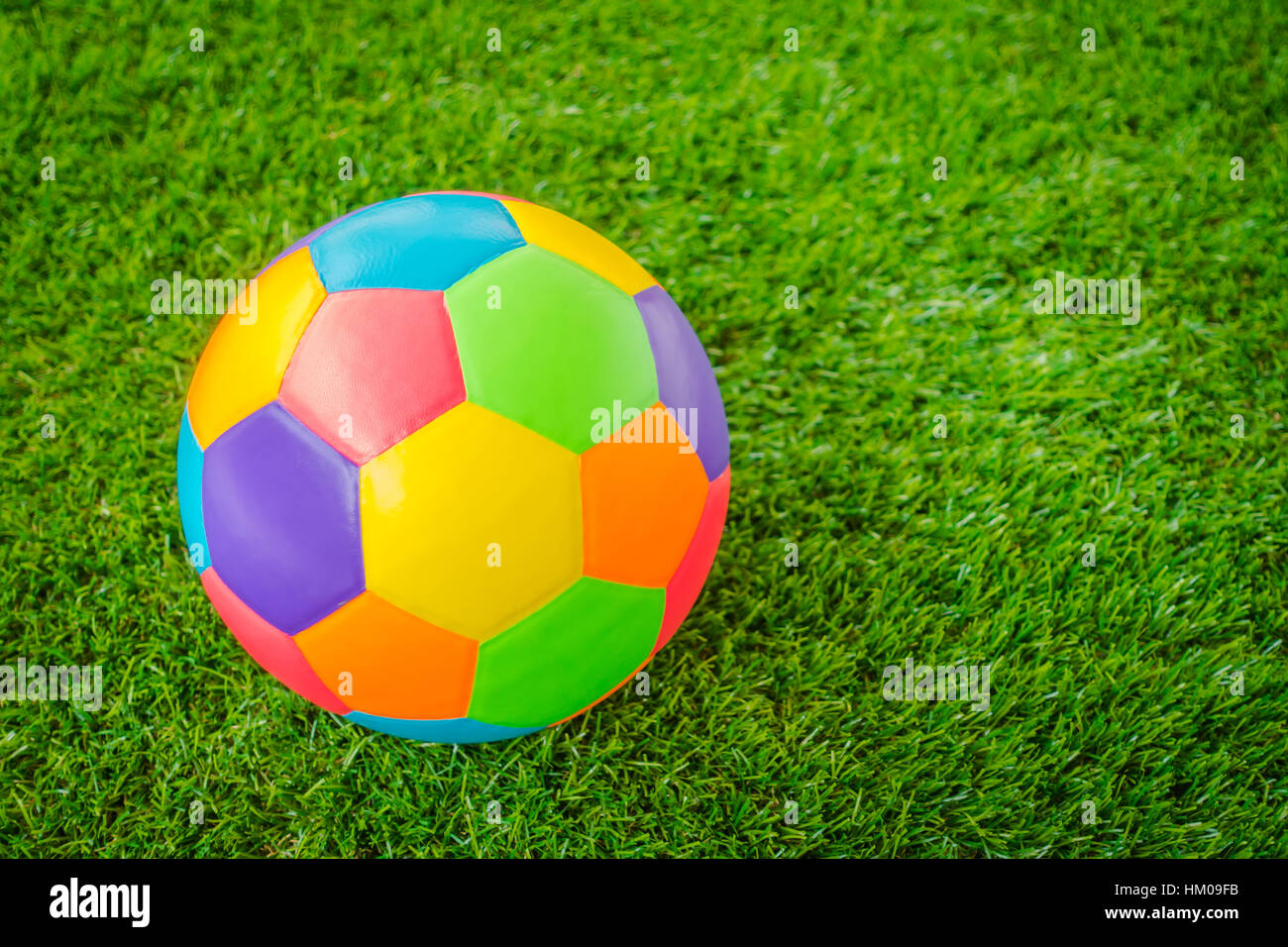 Real leather Colorful multi colour Soccer ball on green grass Stock ...