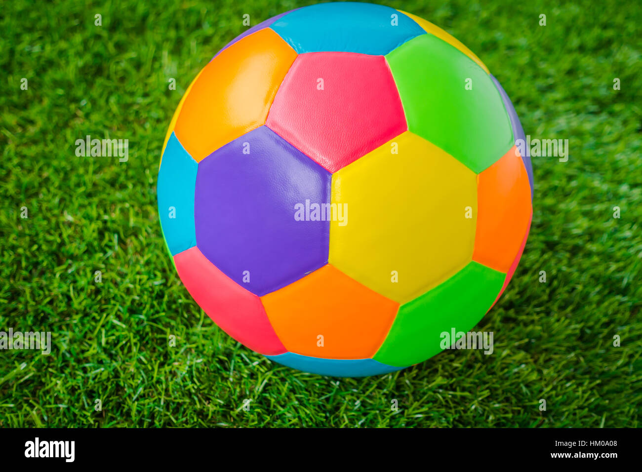 Real leather Colorful multi colour Soccer ball on green grass Stock ...
