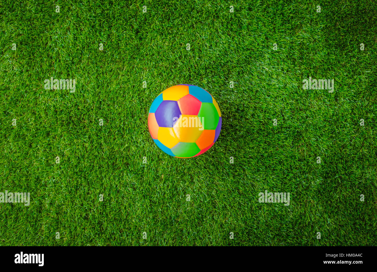 Real leather Colorful multi colour Soccer ball on green grass Stock ...