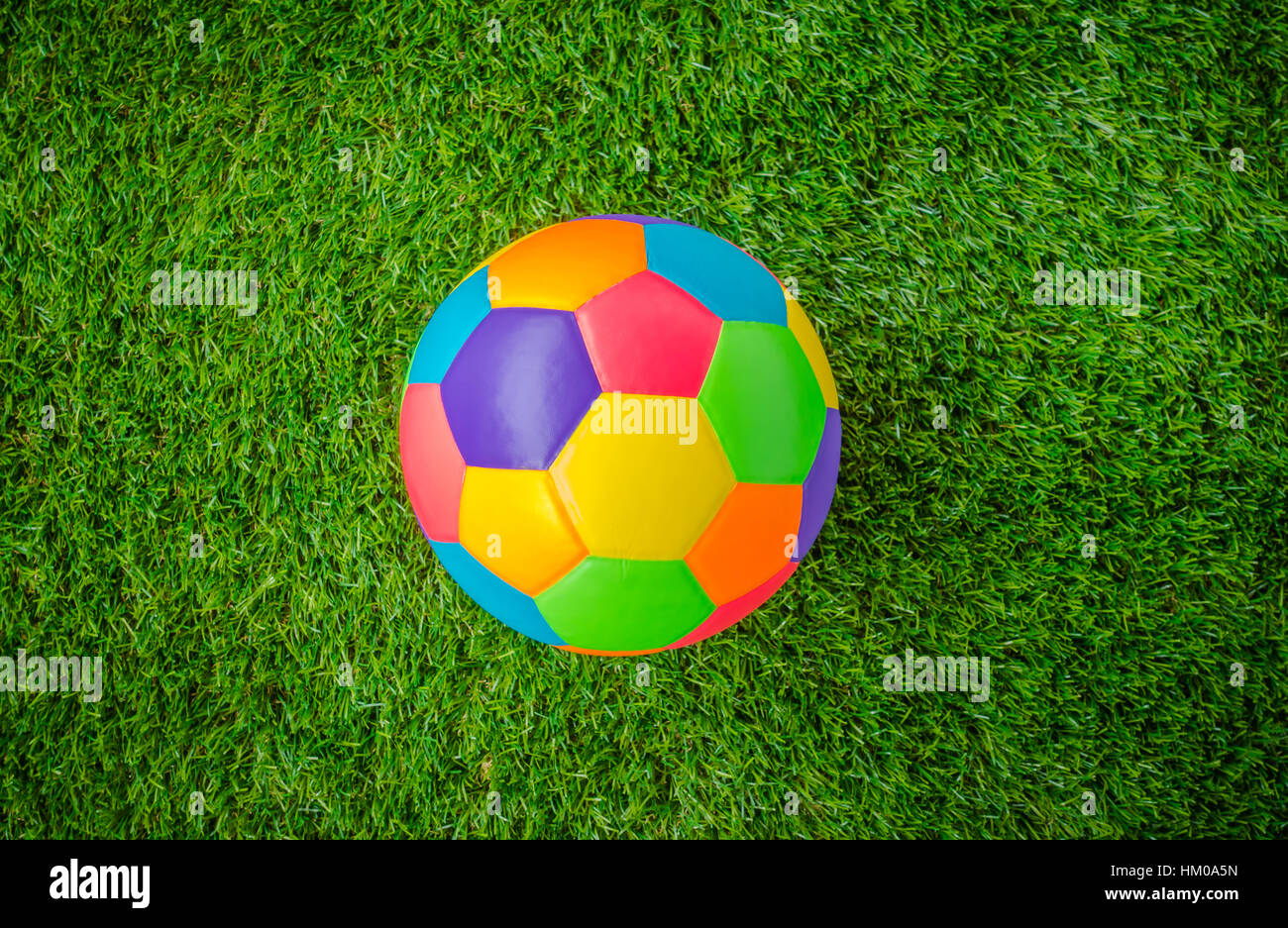 Real leather Colorful multi colour Soccer ball on green grass Stock ...