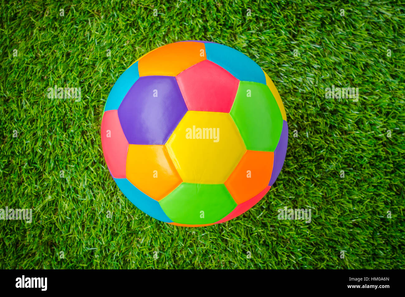 Real leather Colorful multi colour Soccer ball on green grass Stock ...